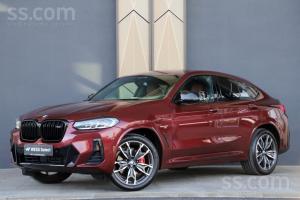 Red BMW X4 2022 in Riga, with an engine capacity of 3.00 L and mileage of 112 thousand km for 42900 €, photo  on AUTOMOTO.COM.LV