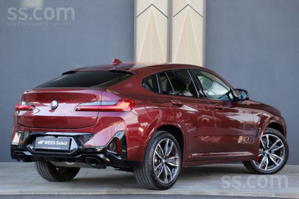 Red BMW X4 2022 in Riga, with an engine capacity of 3.00 L and mileage of 112 thousand km for 42900 €, photo 5 on AUTOMOTO.COM.LV