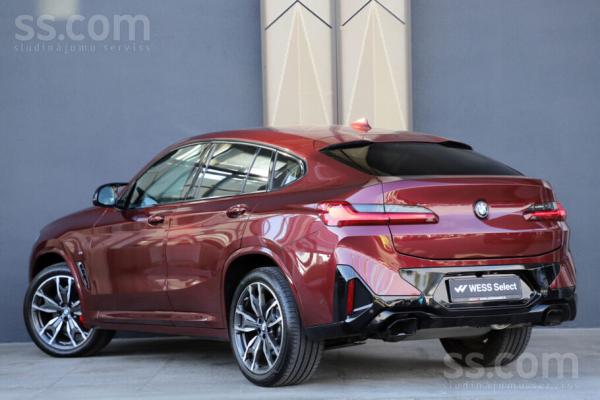 Red BMW X4 2022 in Riga, with an engine capacity of 3.00 L and mileage of 112 thousand km for 42900 €, photo 6 on AUTOMOTO.COM.LV
