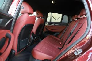 Red BMW X4 2022 in Talsi, with an engine capacity of 3.00 L and mileage of 112 thousand km for 41000 €, photo 6 on AUTOMOTO.COM.LV