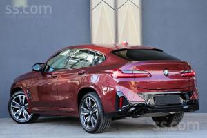 Red BMW X4 2022 in Talsi, with an engine capacity of 3.00 L and mileage of 112 thousand km for 41000 €, photo 11 on AUTOMOTO.COM.LV
