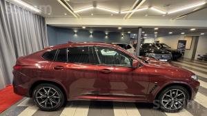 Red BMW X4 2025 in Riga, with an engine capacity of 2.00 L and mileage of 10 thousand km for 49990 €, photo 4 on AUTOMOTO.COM.LV