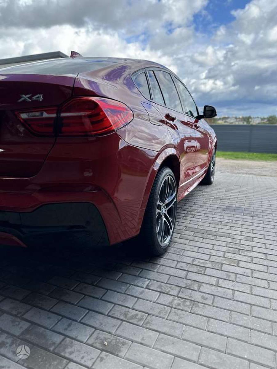 Red BMW X4 2017 in Vilnius, with an engine capacity of 2.00 L and mileage of 123 thousand km for 19300 €, photo 12 on AUTOMOTO.COM.LV