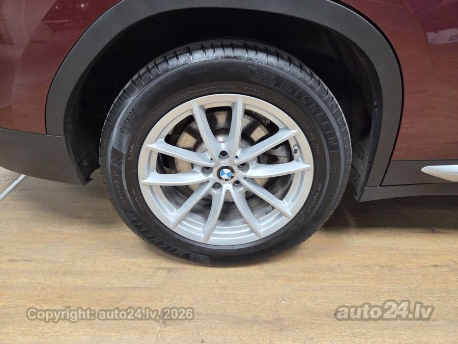 Red BMW X4 2022 in Tallinn, with an engine capacity of 2.00 L and mileage of 58 thousand km for 39900 €, photo 24 on AUTOMOTO.COM.LV