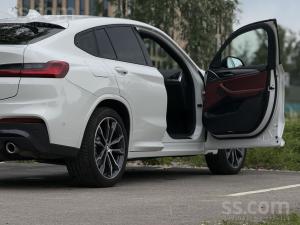 White BMW X4 2019 in Riga, with an engine capacity of 2.00 L and mileage of 158 thousand km for 36900 €, photo 13 on AUTOMOTO.COM.LV