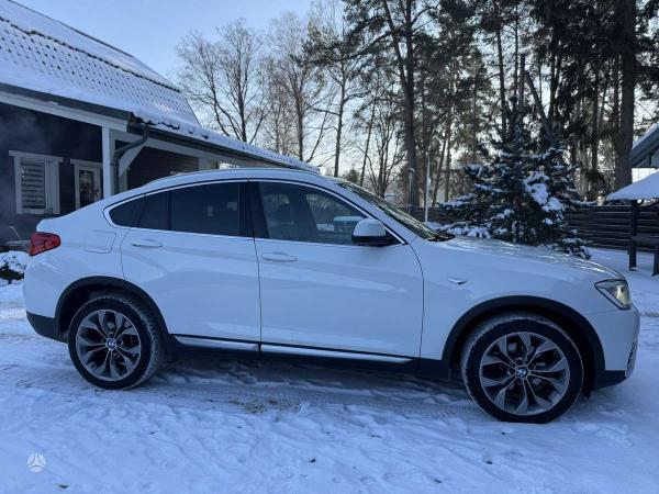 White BMW X4 2014 in Kazlu Ruda, with an engine capacity of 2.00 L and mileage of 245 thousand km for 16000 €, photo 4 on AUTOMOTO.COM.LV