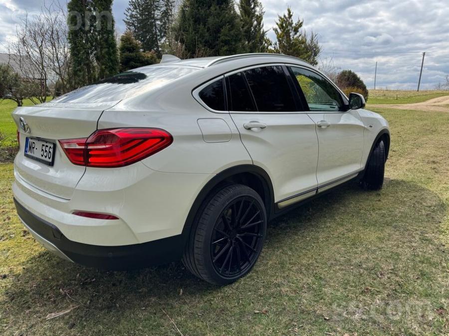 White BMW X4 2015 in Riga, with an engine capacity of 3.00 L and mileage of 245 thousand km for 16500 €, photo 4 on AUTOMOTO.COM.LV