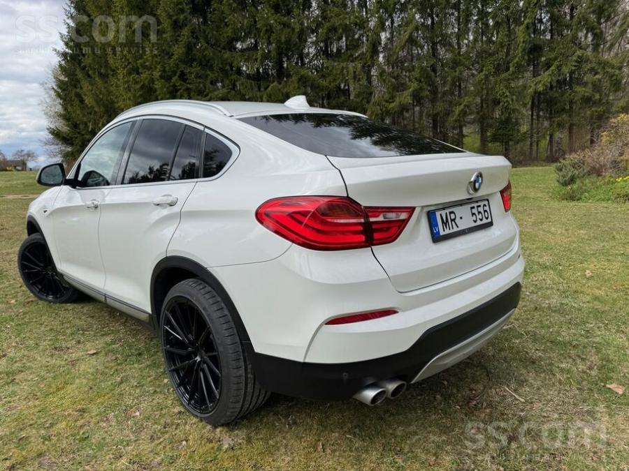 White BMW X4 2015 in Riga, with an engine capacity of 3.00 L and mileage of 245 thousand km for 16500 €, photo 5 on AUTOMOTO.COM.LV