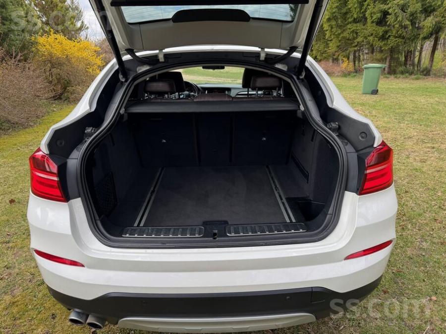 White BMW X4 2015 in Riga, with an engine capacity of 3.00 L and mileage of 245 thousand km for 16500 €, photo 8 on AUTOMOTO.COM.LV