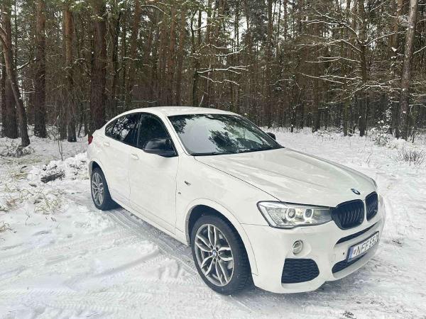 White BMW X4 2016 in Jonava, with an engine capacity of 2.99 L and mileage of 280 thousand km for 17500 €, photo 4 on AUTOMOTO.COM.LV