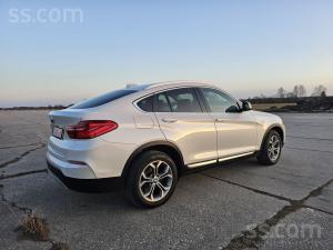 White BMW X4 2016 in Riga, with an engine capacity of 2.00 L and mileage of 180 thousand km for 16990 €, photo 11 on AUTOMOTO.COM.LV