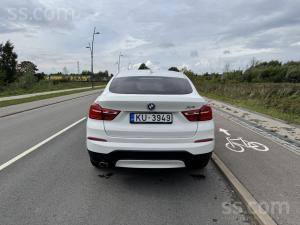 White BMW X4 2017 in Riga, with an engine capacity of 2.00 L and mileage of 120 thousand km for 21900 €, photo 7 on AUTOMOTO.COM.LV