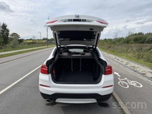 White BMW X4 2017 in Riga, with an engine capacity of 2.00 L and mileage of 120 thousand km for 21900 €, photo 21 on AUTOMOTO.COM.LV
