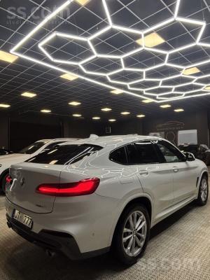 White BMW X4 2018 in Riga, with an engine capacity of 3.00 L and mileage of 59 thousand km for 35500 €, photo 5 on AUTOMOTO.COM.LV