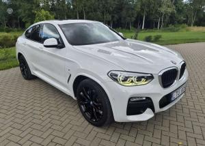 White BMW X4 2018 in Utena, with an engine capacity of 2.00 L and mileage of 216 thousand km for 27500 €, photo 8 on AUTOMOTO.COM.LV
