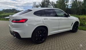 White BMW X4 2018 in Utena, with an engine capacity of 2.00 L and mileage of 216 thousand km for 27500 €, photo 12 on AUTOMOTO.COM.LV