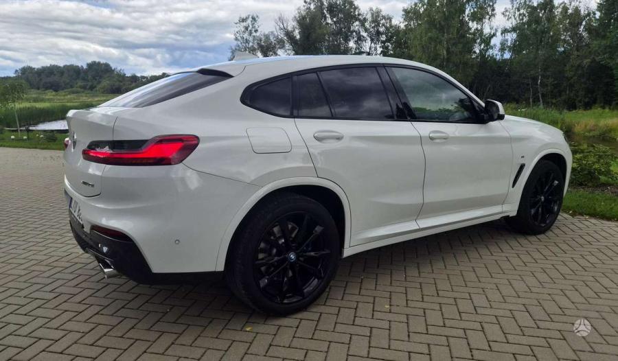 White BMW X4 2018 in Utena, with an engine capacity of 2.00 L and mileage of 216 thousand km for 27500 €, photo 12 on AUTOMOTO.COM.LV