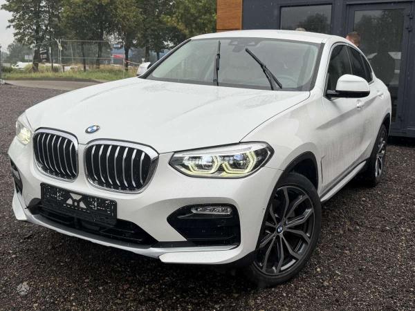 BMW X4 2020 in Kaunas on AUTOMOTO.COM.LV White BMW X4 2020 in Kaunas, with an engine capacity of 2.00 L and mileage of 135 thousand km for 29900 €, photo 3 on AUTOMOTO.COM.LV