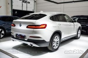 White BMW X4 2021 in Tallinn, with an engine capacity of 2.00 L and mileage of 84 thousand km for 39900 €, photo 5 on AUTOMOTO.COM.LV