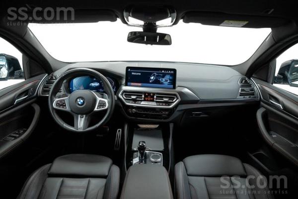 White BMW X4 2023 in Riga, with an engine capacity of 3.00 L and mileage of 65 thousand km for 47500 €, photo 4 on AUTOMOTO.COM.LV