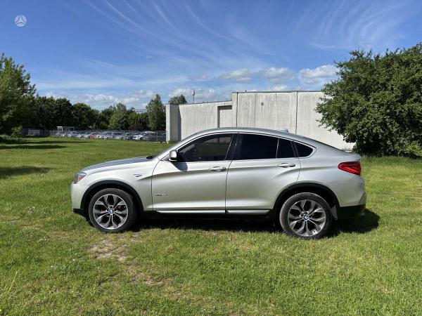 Yellow BMW X4 2015 in Kaunas, with an engine capacity of 2.00 L and mileage of 252 thousand km for 11999 €, photo 5 on AUTOMOTO.COM.LV