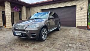 Smilšu krāsa BMW X5 2010 Tartu, ar dzinēja tilpumu 3.00 L un nobraukumu 396 tūkst. km par 10900 €, foto  vietnē AUTOMOTO.COM.LV
