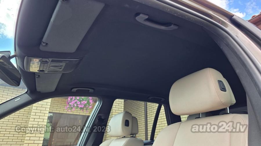 Smilšu krāsa BMW X5 2010 Tartu, ar dzinēja tilpumu 3.00 L un nobraukumu 396 tūkst. km par 10900 €, foto 13 vietnē AUTOMOTO.COM.LV