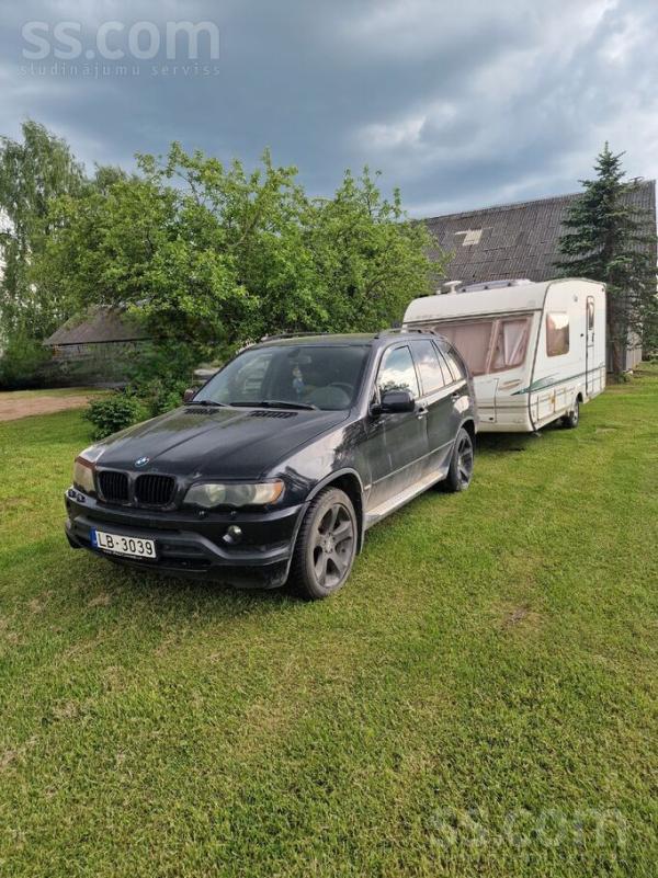 Черный БМВ Х5 2003 в Валмиера, объемом двигателя 3.00 л и пробегом 207 тыс. км за 2400 €, фото 1 на AUTOMOTO.COM.LV