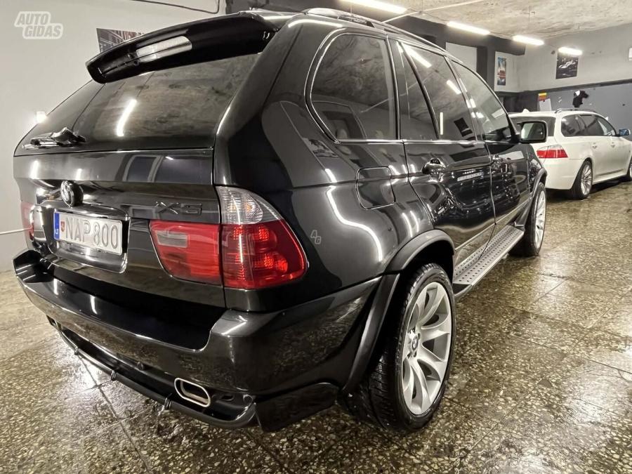 Black BMW X5 2004 in Kaunas, with an engine capacity of 4.40 L and mileage of 372 thousand km for 7299 €, photo 6 on AUTOMOTO.COM.LV