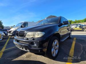 Melns BMW X5 2004 Tallina, ar dzinēja tilpumu 4.40 L un nobraukumu 311 tūkst. km par 333 €, foto  vietnē AUTOMOTO.COM.LV