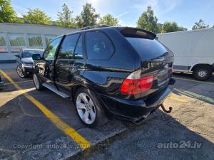 Black BMW X5 2004 in Tallinn, with an engine capacity of 4.40 L and mileage of 311 thousand km for 333 €, photo 5 on AUTOMOTO.COM.LV