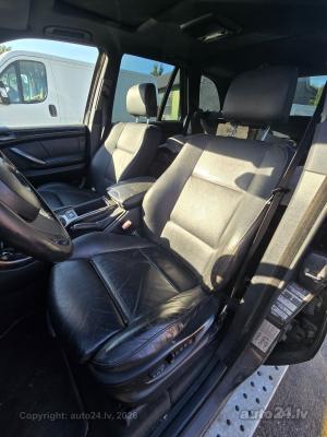 Black BMW X5 2004 in Tallinn, with an engine capacity of 4.40 L and mileage of 311 thousand km for 333 €, photo 6 on AUTOMOTO.COM.LV