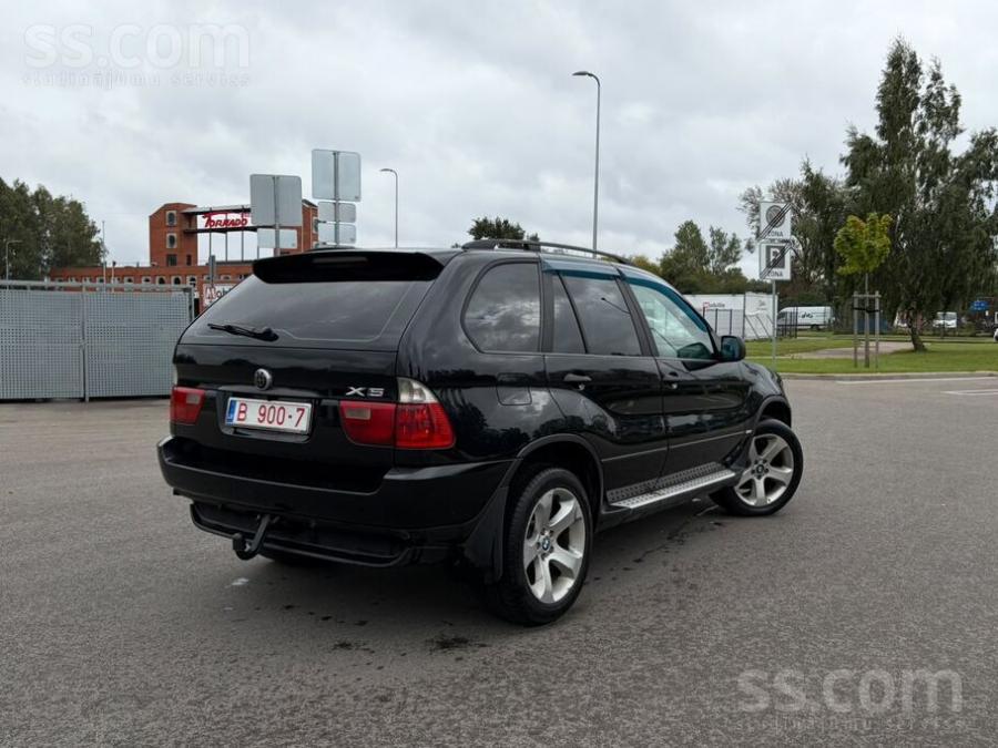 Black BMW X5 2004 in Riga, with an engine capacity of 3.00 L and mileage of 0 thousand km for 4790 €, photo 4 on AUTOMOTO.COM.LV