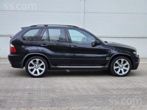 Black BMW X5 2005 in Riga, with an engine capacity of 4.80 L and mileage of 371 thousand km for 8490 €, photo 8 on AUTOMOTO.COM.LV