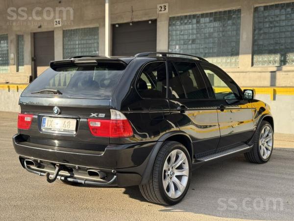 Black BMW X5 2005 in Riga, with an engine capacity of 4.80 L and mileage of 291 thousand km for 14990 €, photo 3 on AUTOMOTO.COM.LV