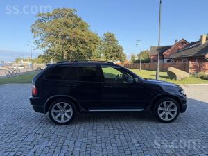 Black BMW X5 2005 in Ventspils, with an engine capacity of 4.40 L and mileage of 247 thousand km for 8500 €, photo 4 on AUTOMOTO.COM.LV