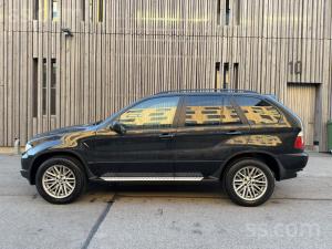 Black BMW X5 2005 in Riga, with an engine capacity of 3.00 L and mileage of 424 thousand km for 4590 €, photo 5 on AUTOMOTO.COM.LV
