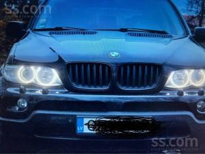 Black BMW X5 2006 in Bauska, with an engine capacity of 3.00 L and mileage of 389 thousand km for 7500 €, photo  on AUTOMOTO.COM.LV