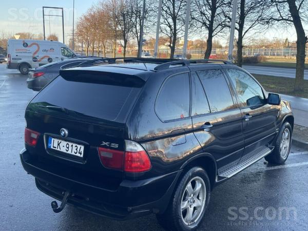 Black BMW X5 2006 in Riga, with an engine capacity of 3.00 L and mileage of 0 thousand km for 5800 €, photo 5 on AUTOMOTO.COM.LV