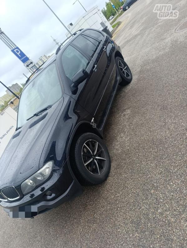 Black BMW X5 2006 in Alytus, with an engine capacity of 3.00 L and mileage of 351 thousand km for 6750 €, photo 5 on AUTOMOTO.COM.LV