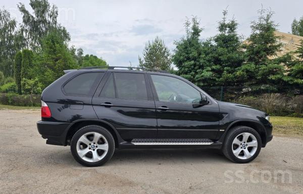Black BMW X5 2006 in Jelgava, with an engine capacity of 3.00 L and mileage of 187 thousand km for 6900 €, photo 5 on AUTOMOTO.COM.LV