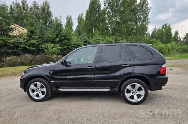 Black BMW X5 2006 in Jelgava, with an engine capacity of 3.00 L and mileage of 187 thousand km for 6900 €, photo 6 on AUTOMOTO.COM.LV