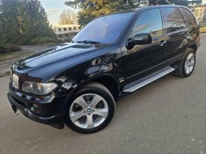 Black BMW X5 2006 in Jekabpils, with an engine capacity of 3.00 L and mileage of 331 thousand km for 4790 €, photo 12 on AUTOMOTO.COM.LV