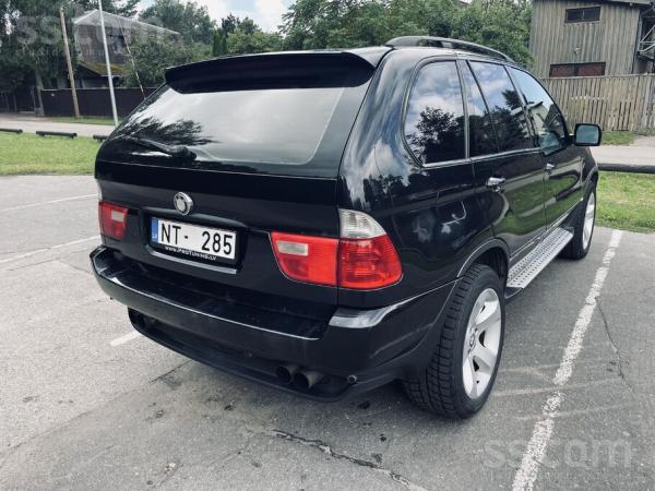 Black BMW X5 2006 in Riga, with an engine capacity of 3.00 L and mileage of 413 thousand km for 3500 €, photo 5 on AUTOMOTO.COM.LV
