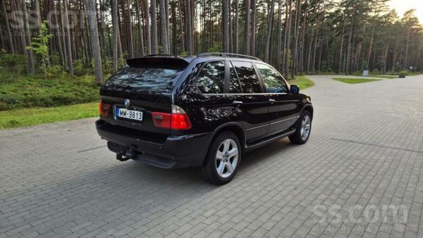 Black BMW X5 2006 in Riga, with an engine capacity of 3.00 L and mileage of 418 thousand km for 4300 €, photo 5 on AUTOMOTO.COM.LV