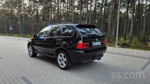 Black BMW X5 2006 in Riga, with an engine capacity of 3.00 L and mileage of 418 thousand km for 4300 €, photo 7 on AUTOMOTO.COM.LV