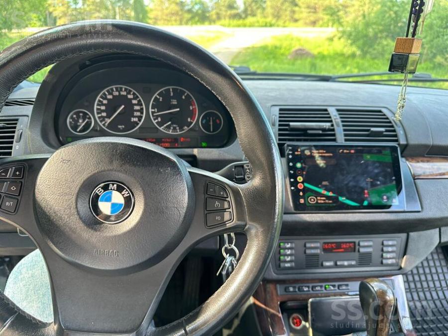 Black BMW X5 2006 in Riga, with an engine capacity of 3.00 L and mileage of 316 thousand km for 6499 €, photo 5 on AUTOMOTO.COM.LV