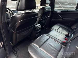 Black BMW X5 2007 in Riga, with an engine capacity of 3.00 L and mileage of 280 thousand km for 10650 €, photo 12 on AUTOMOTO.COM.LV