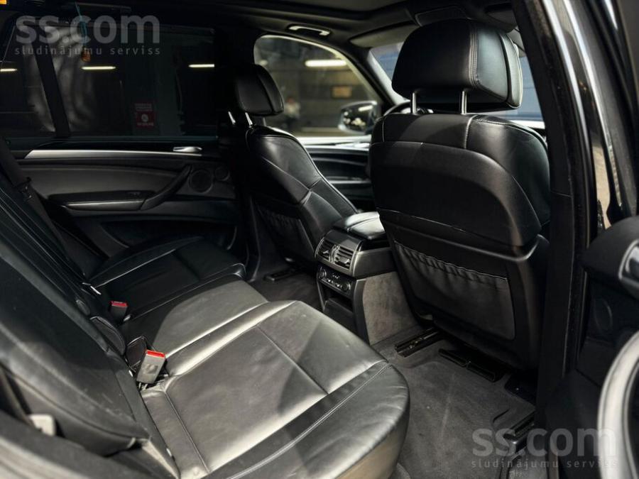 Black BMW X5 2007 in Riga, with an engine capacity of 3.00 L and mileage of 280 thousand km for 10650 €, photo 14 on AUTOMOTO.COM.LV