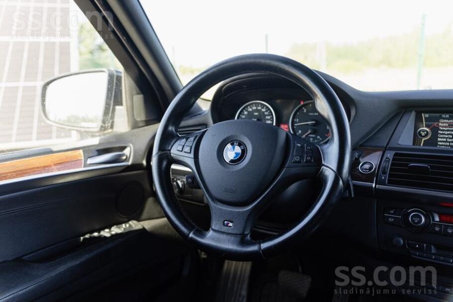 Black BMW X5 2007 in Riga, with an engine capacity of 3.00 L and mileage of 0 thousand km for 9990 €, photo 15 on AUTOMOTO.COM.LV